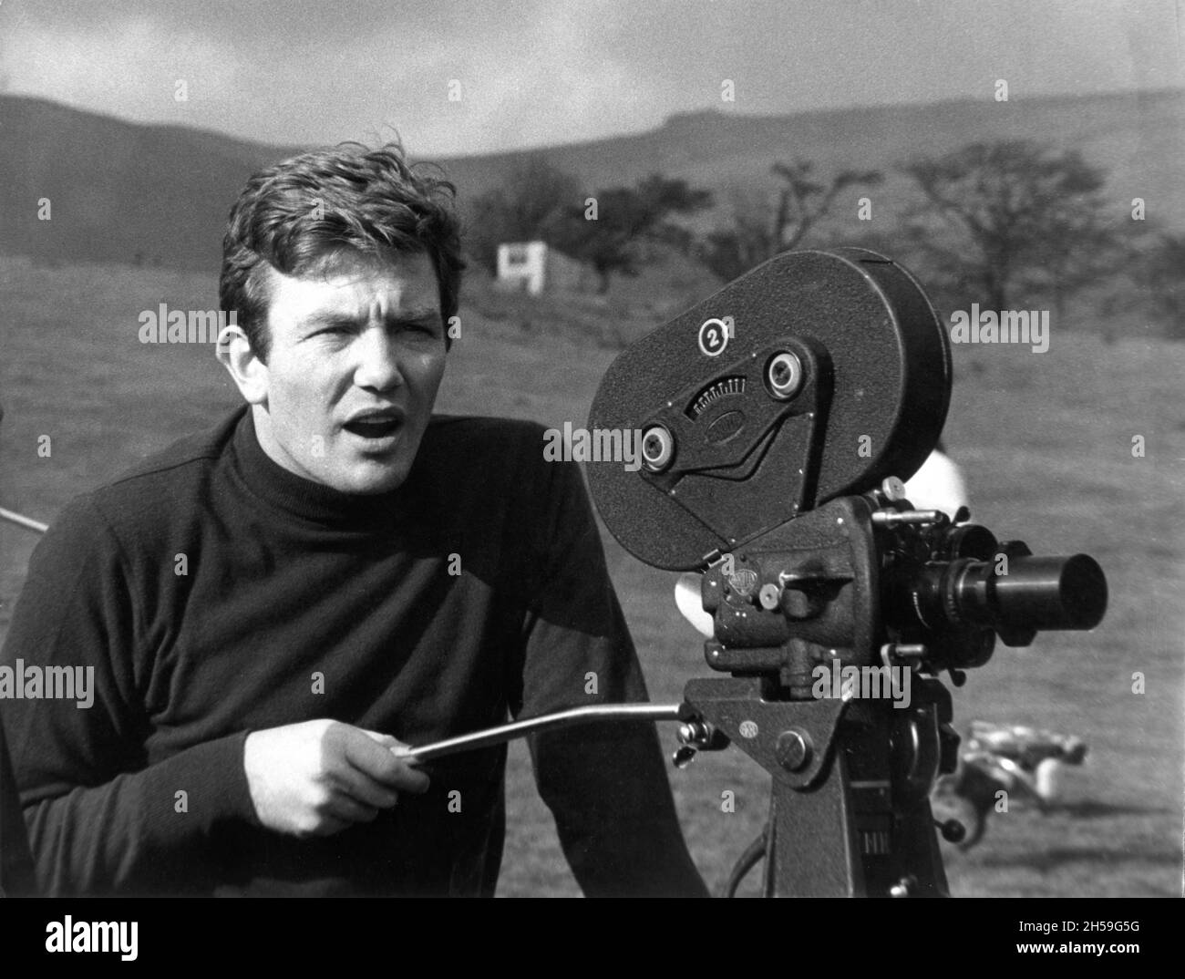 Star / Director ALBERT FINNEY on set location candid with Movie camera ...