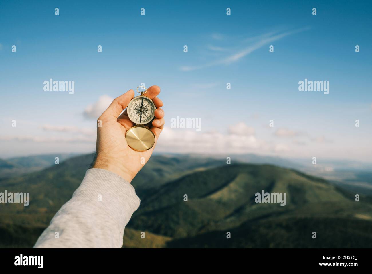 Hand compass blue hi-res stock photography and images - Alamy