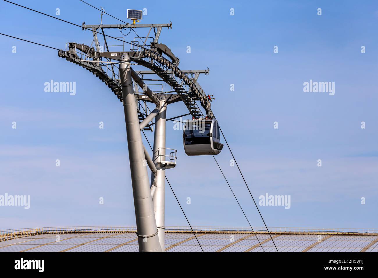 Cable car cabins against amazing sky and clouds. Cableway Stock Photo ...