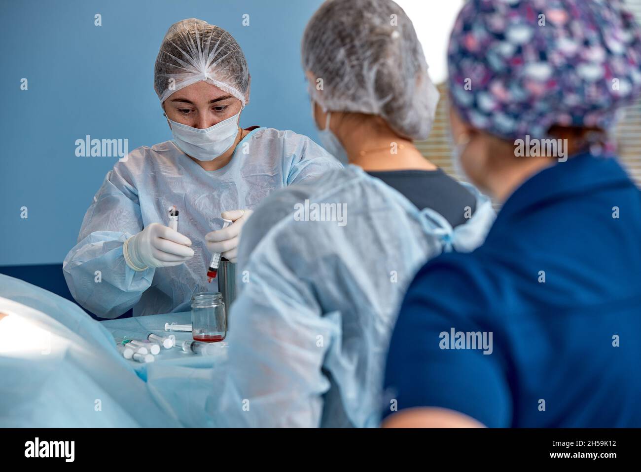The medical team performs the operation - a series of images related to ...