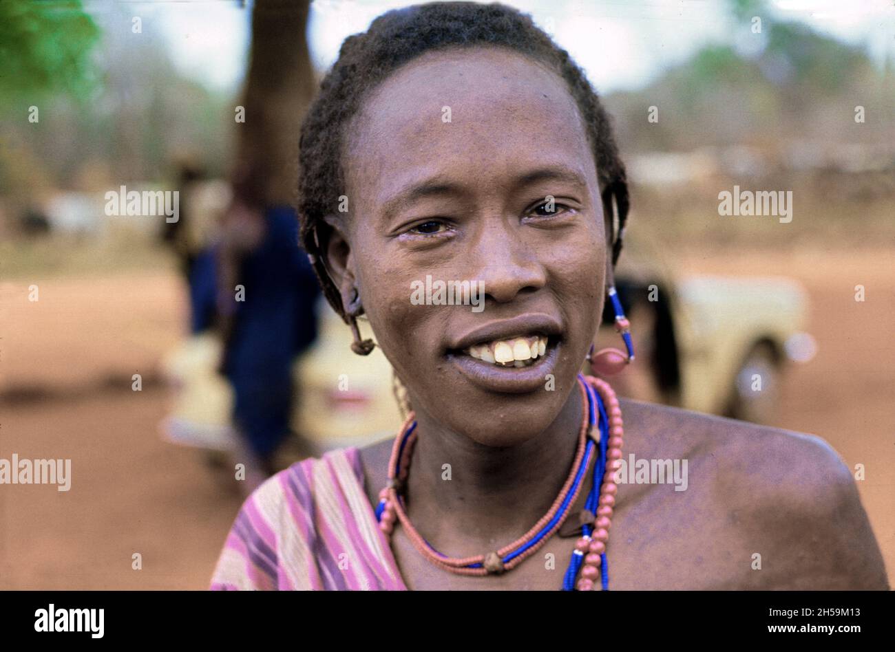 Africa, Tanzania, 1976. A smiling young Maasai man Stock Photo - Alamy