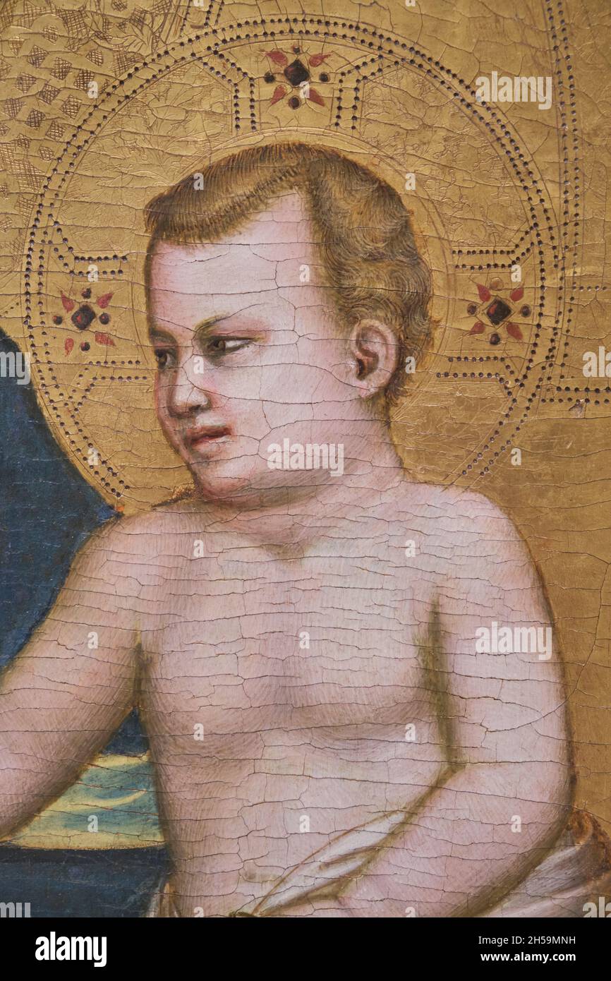 A detail of a baby Jesus in a gold tempera on panel painting titled ...