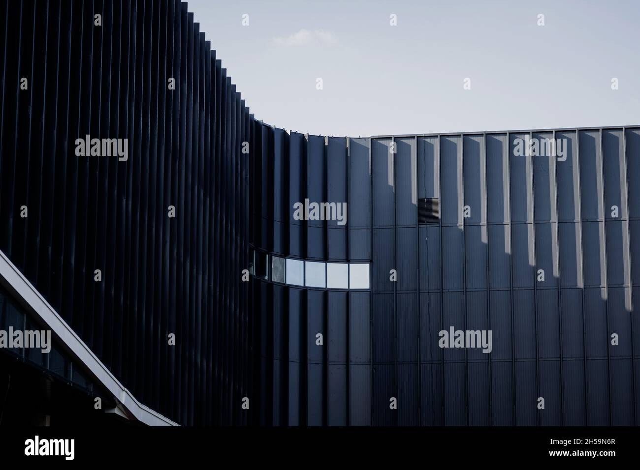 exterior of a trendy shopping mall. urban architecture made of steel ...