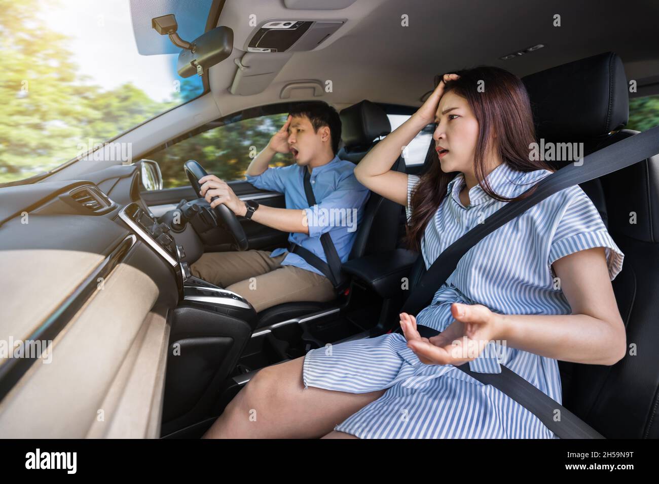 shocked and scared young couple while driving a car Stock Photo - Alamy