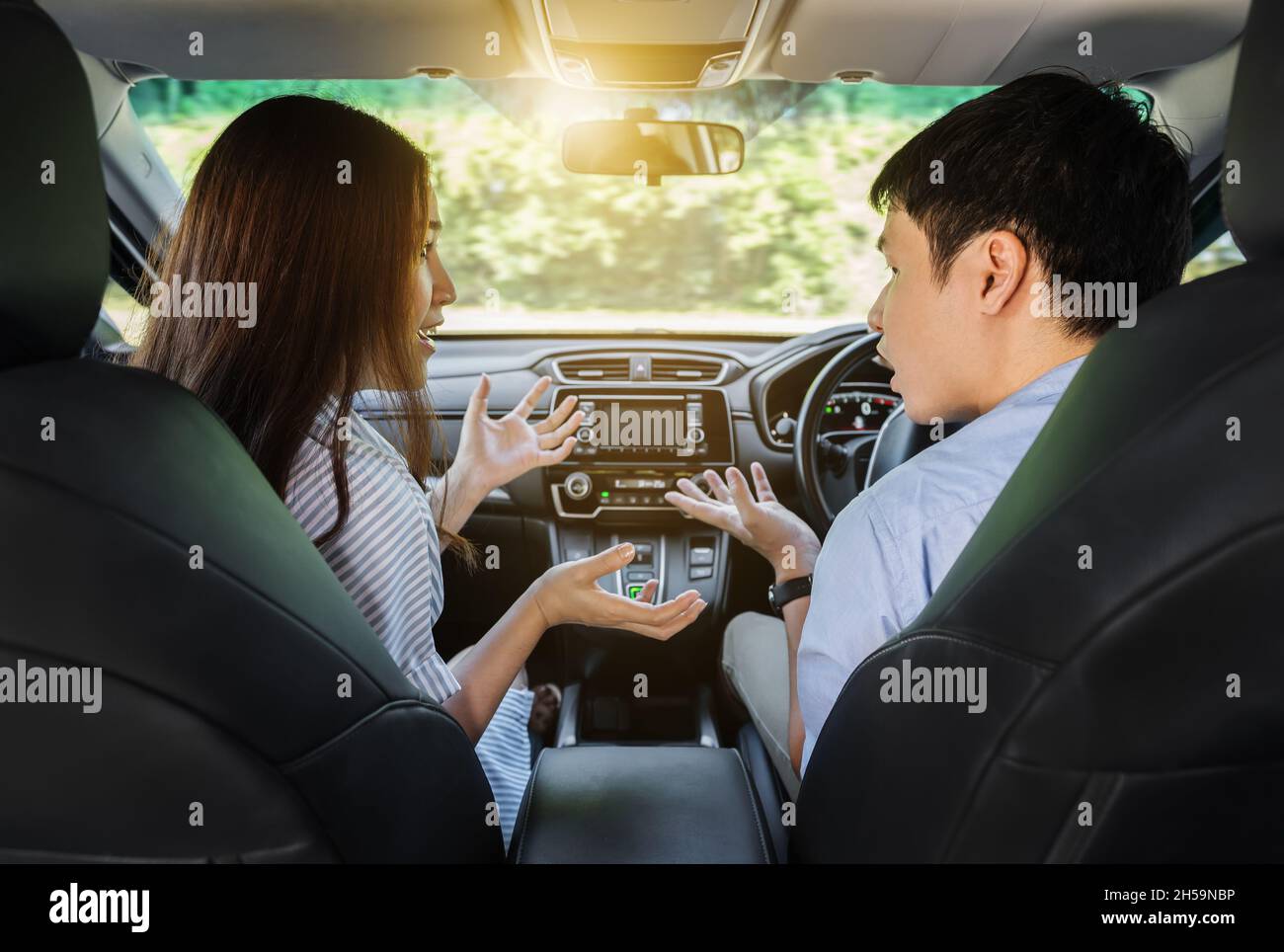 young couple arguing while driving a car Stock Photo - Alamy