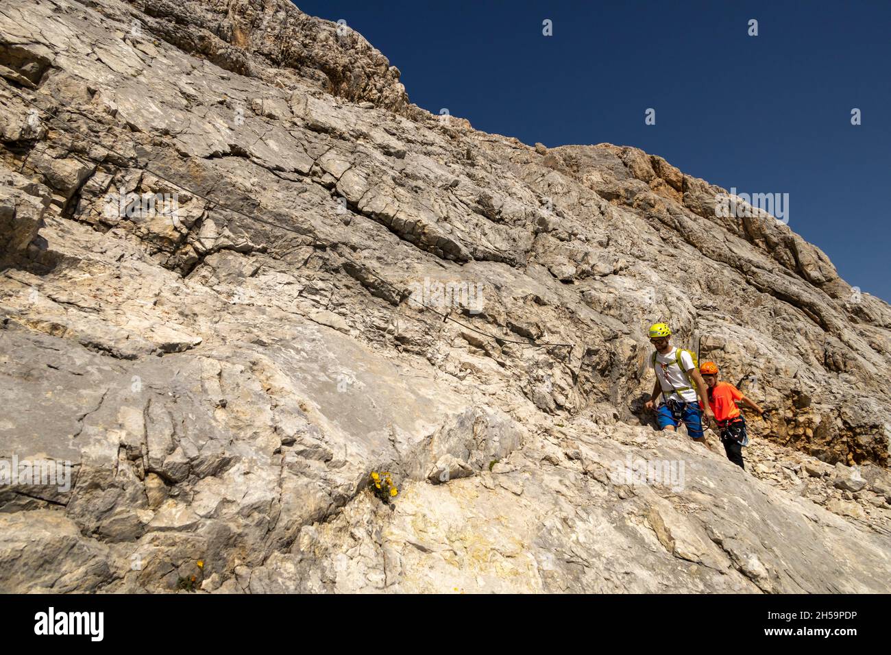 Italy Veneto - Hikers along the Ferrata Formenton Stock Photo - Alamy