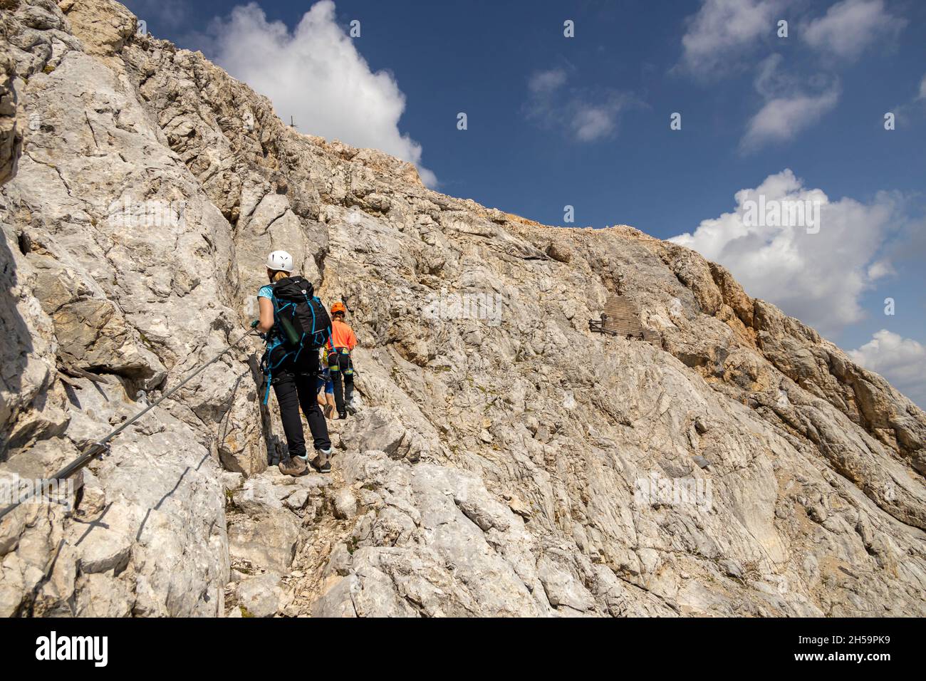 Italy Veneto - Hikers along the Ferrata Formenton Stock Photo - Alamy