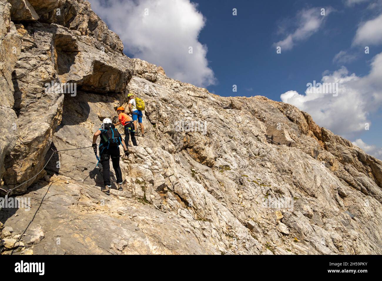Italy Veneto - Hikers along the Ferrata Formenton Stock Photo - Alamy