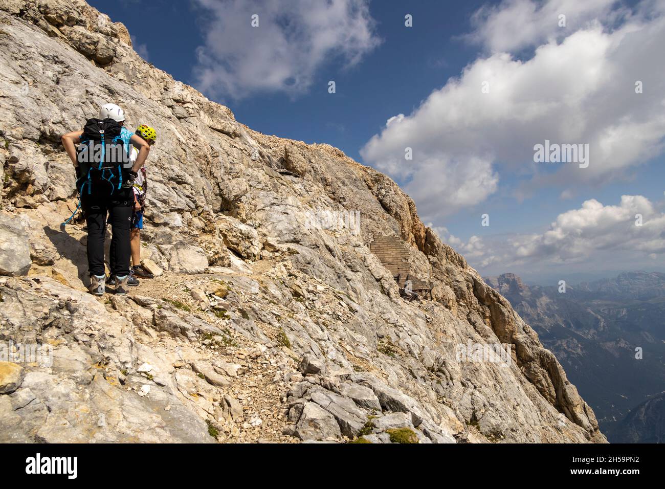 Italy Veneto - Hikers along the Ferrata Formenton Stock Photo - Alamy