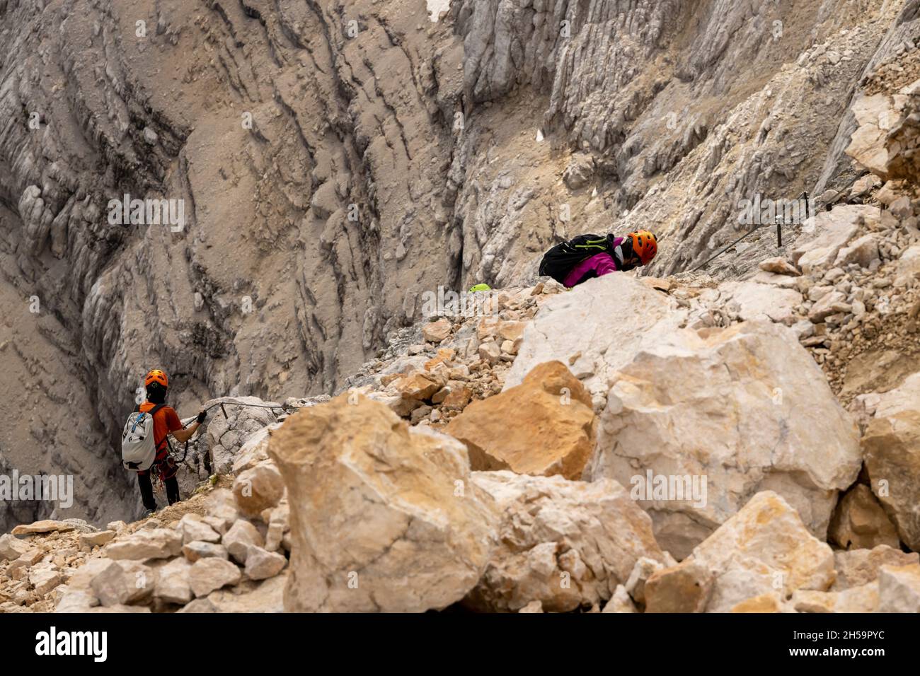 Italy Veneto - Hikers along the Ferrata Formenton Stock Photo - Alamy