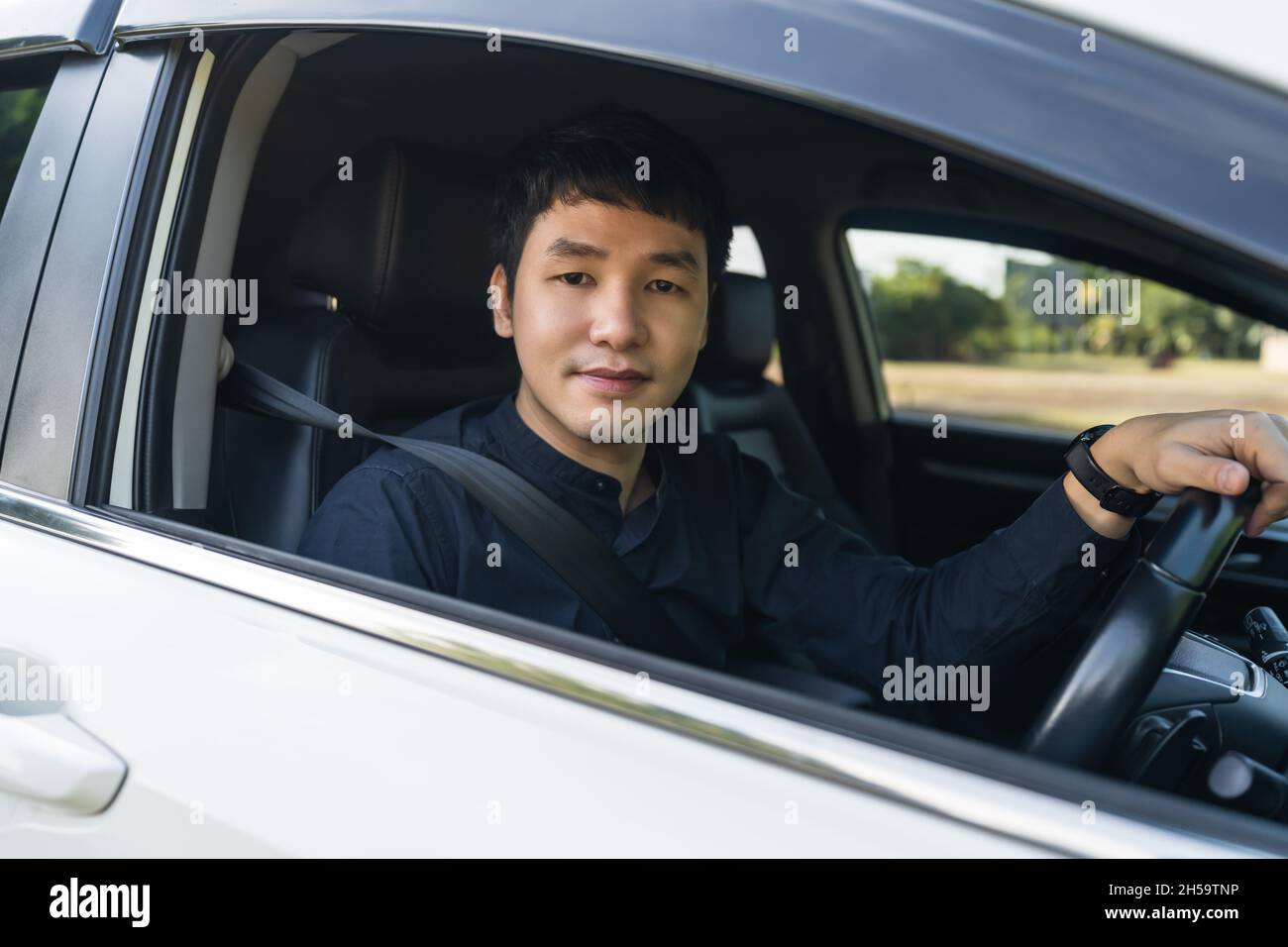 young man driving a car Stock Photo - Alamy