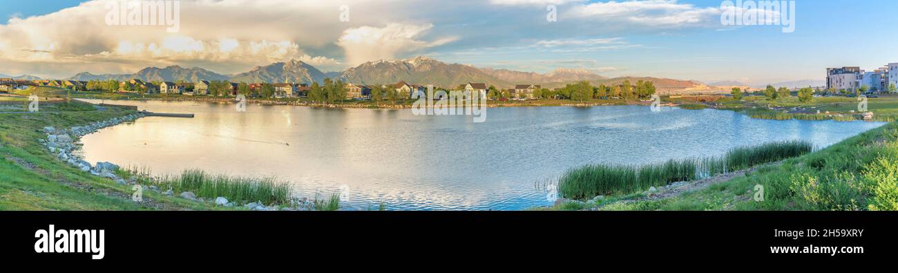 Panoramic view of the residential area against the mountain range ...