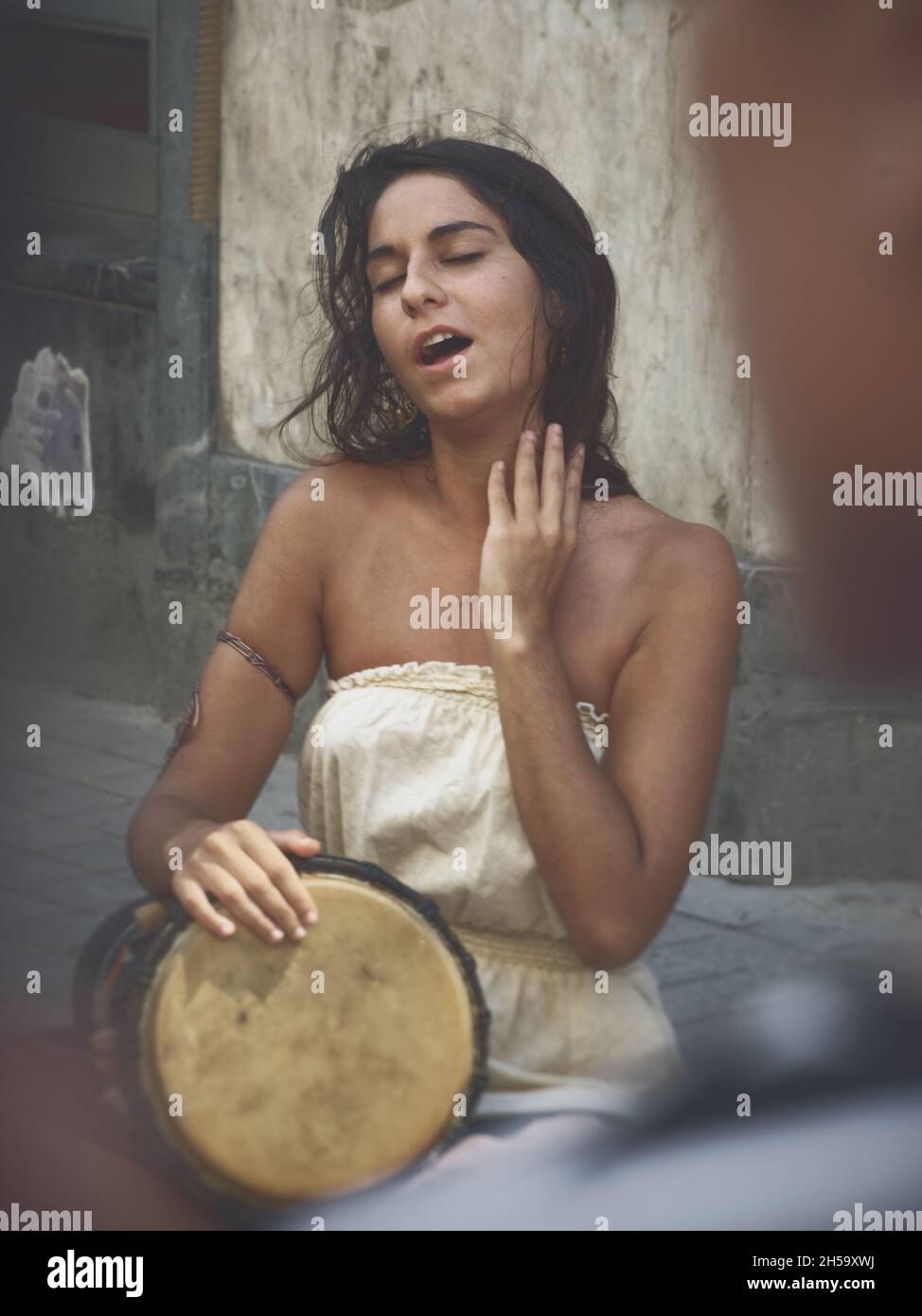 street music in Istanbul young woman Michal Elia Kamal percussionist ...