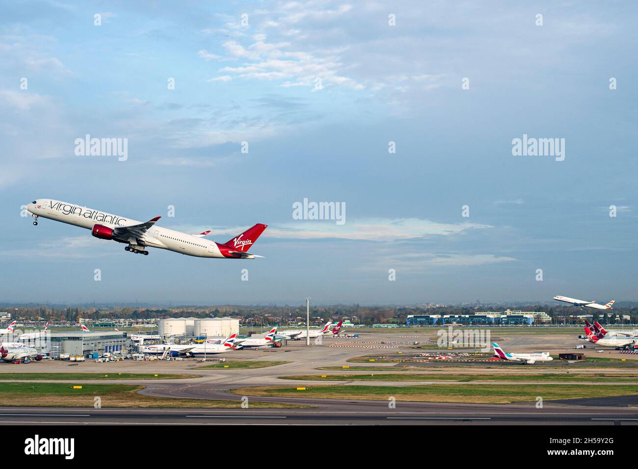 EDITORIAL USE ONLY Virgin Atlantic flight VS3 (front) and British ...