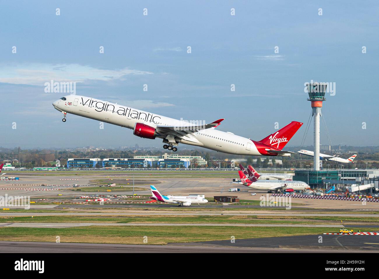 EDITORIAL USE ONLY Virgin Atlantic flight VS3 (front) and British ...