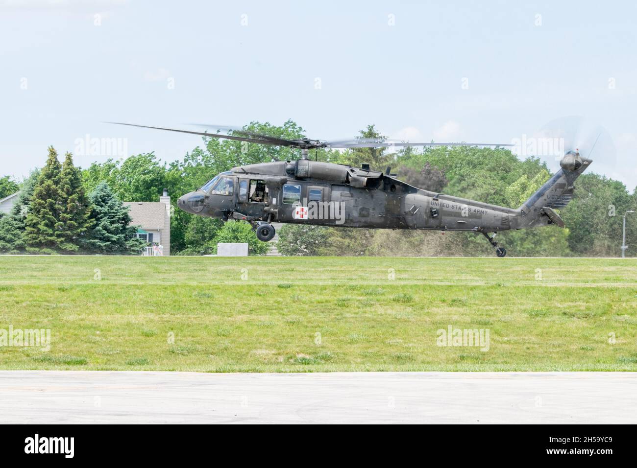 Military helicopter taking off in an airbase Stock Photo - Alamy