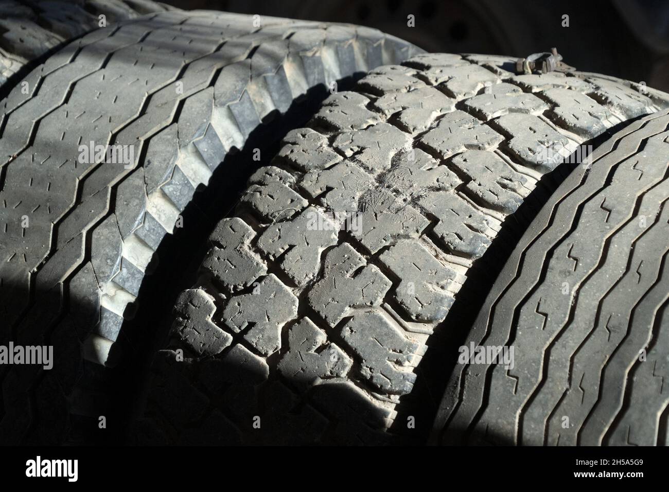lot of old tires detail close up Stock Photo - Alamy