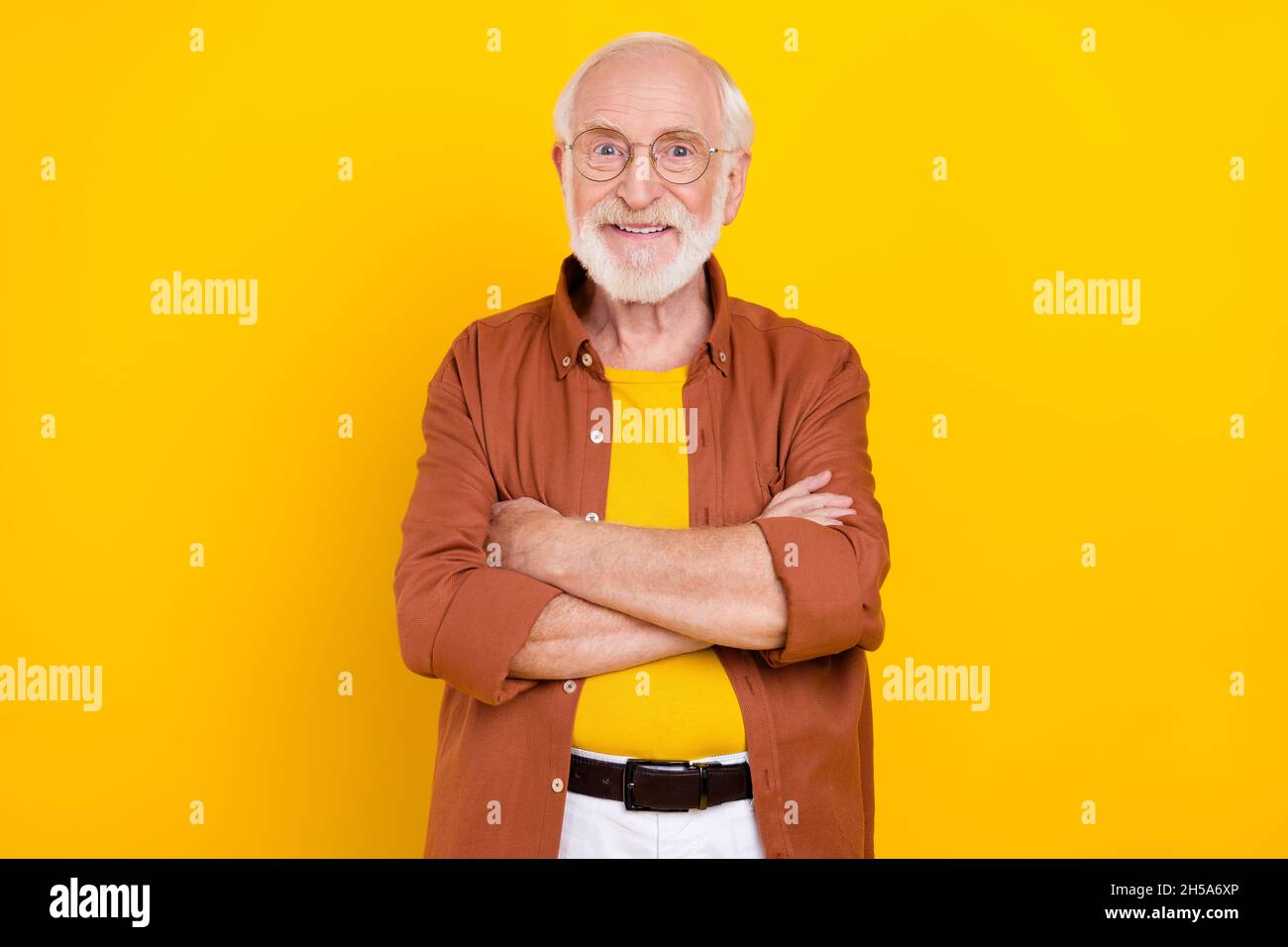 Photo of funny positive grandpa crossed hands beaming smile wear specs ...