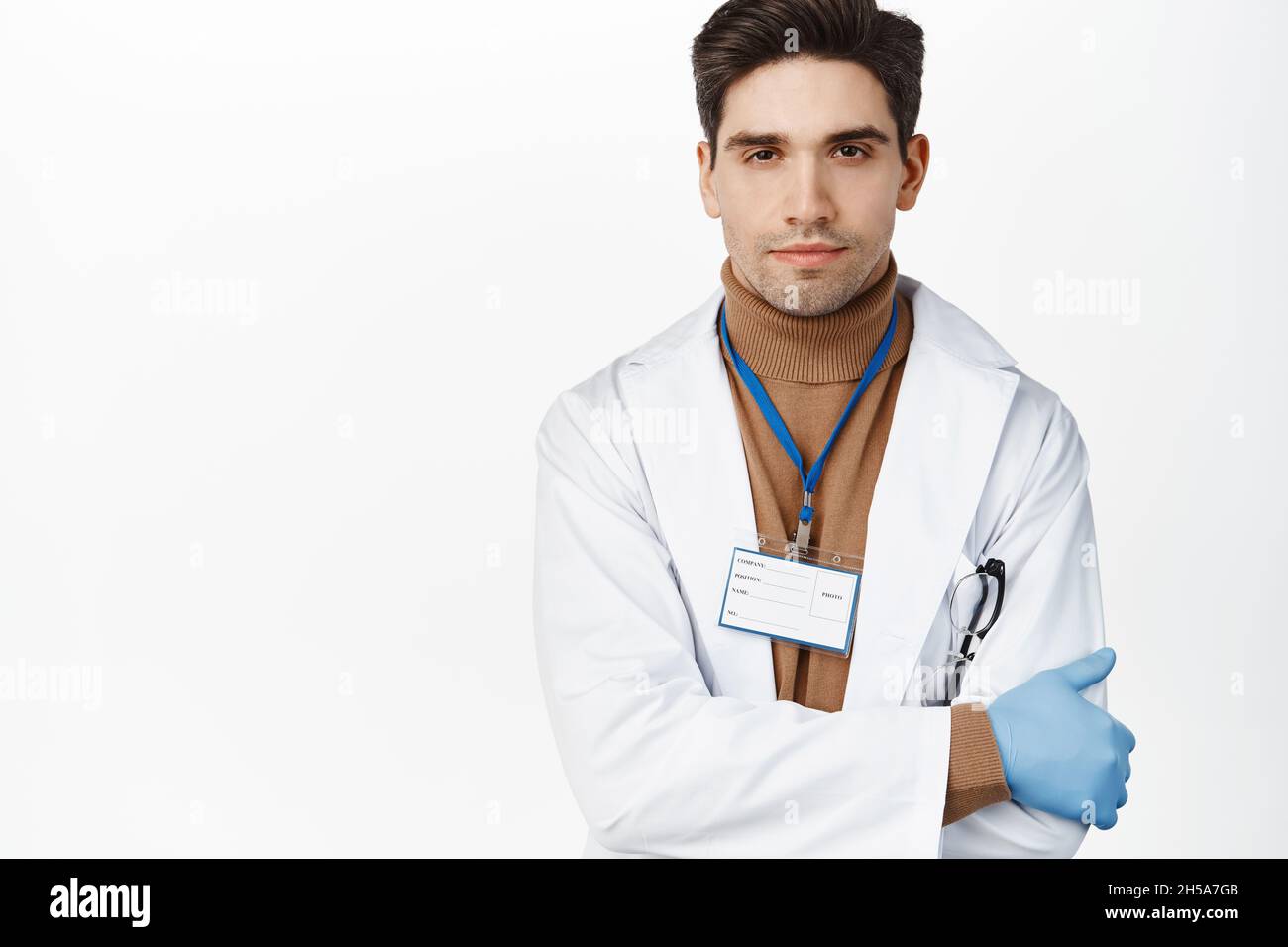 Healthcare and medicine. Male doctor in medical robe and name tag ...
