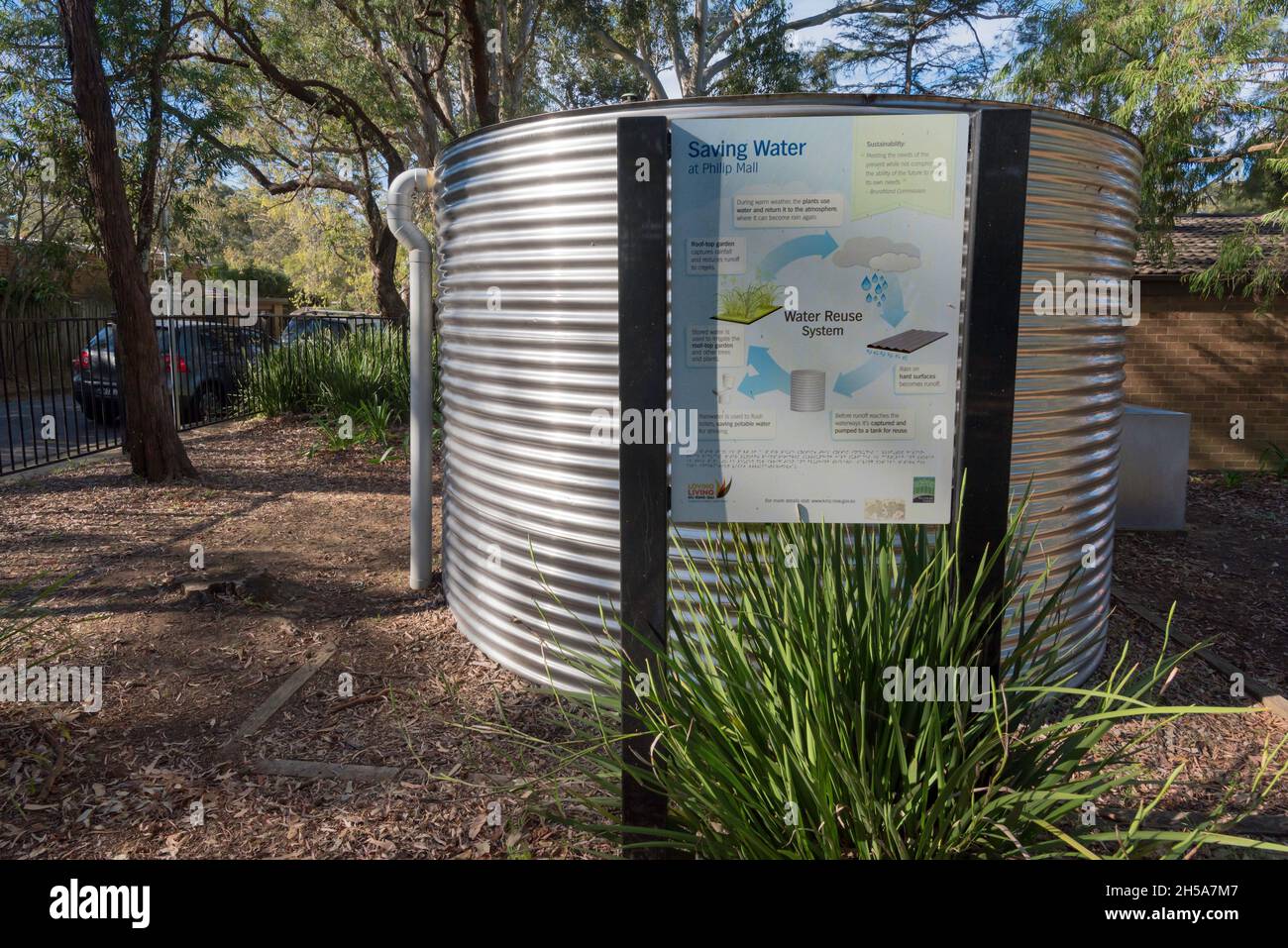 A large steel water tank sits on the ground near Phillip Mall shopping ...