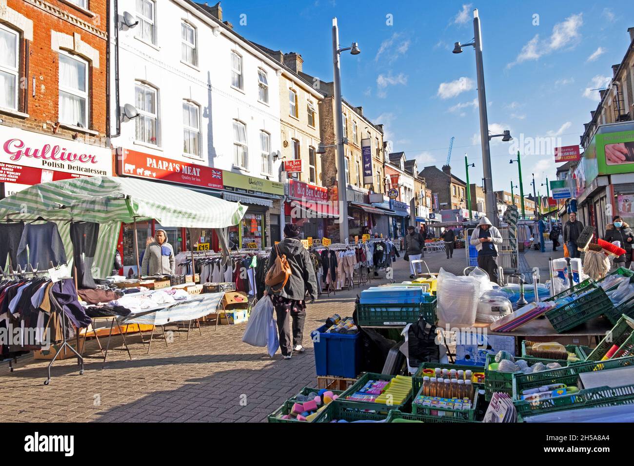 Walthamstow High Street market stalls, shops people shopping in autumn ...