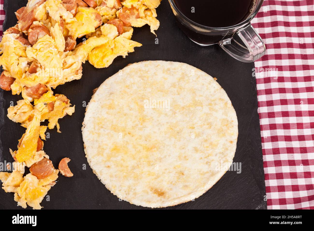 Traditional Latin American Breakfast; White Corn Arepa with Scrambled ...