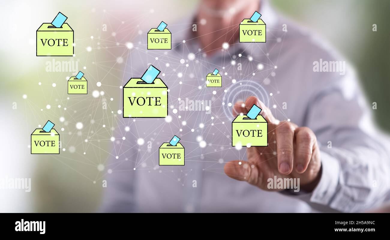 Man touching an online voting concept on a touch screen with his finger ...
