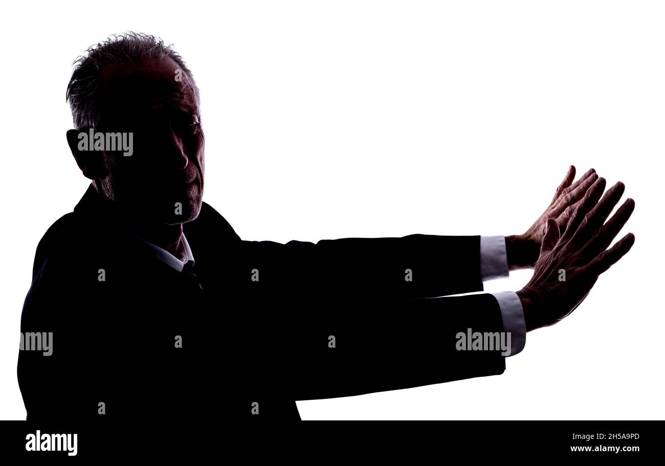 Silhouette of a man expressing disgust Stock Photo - Alamy