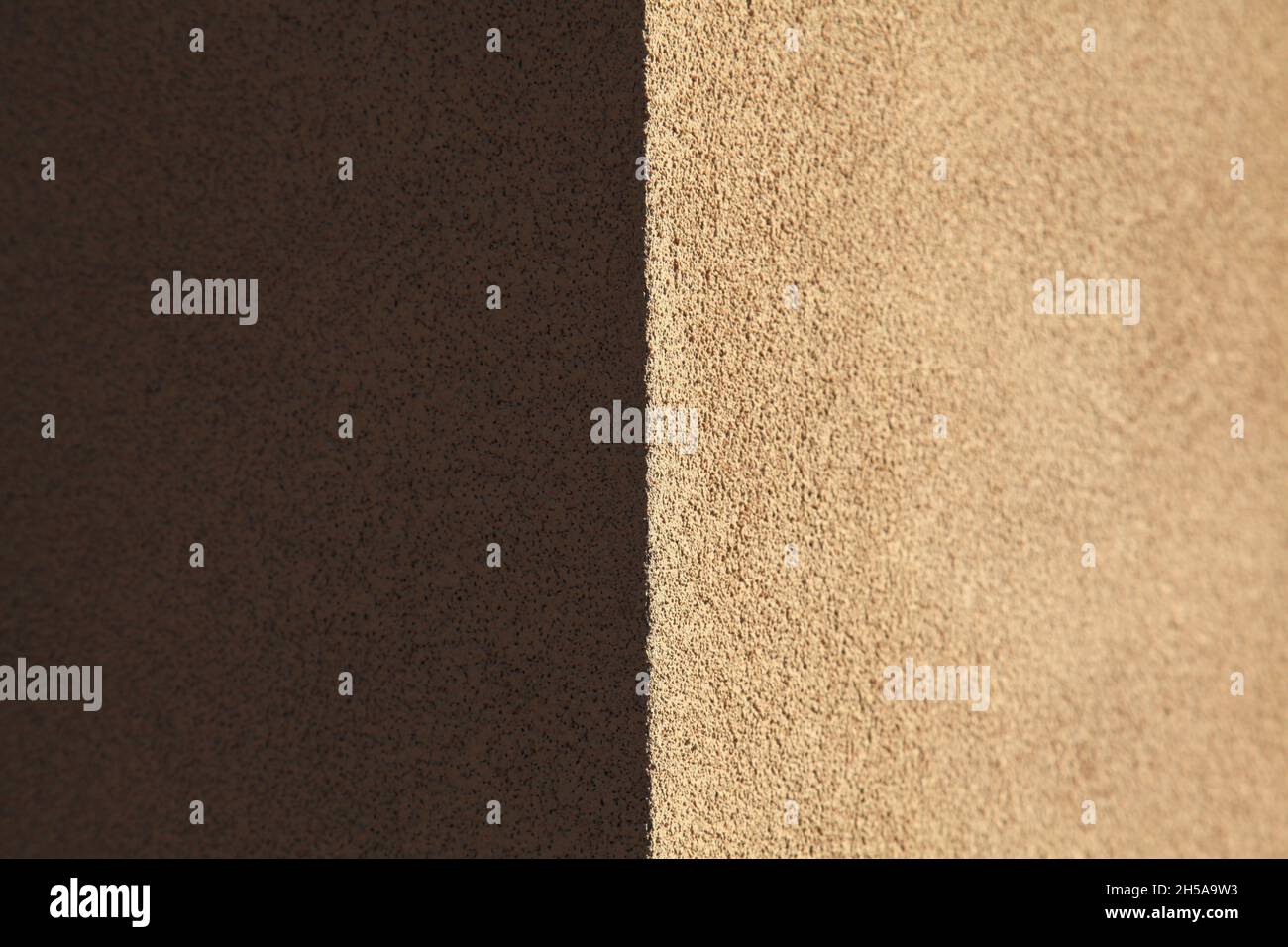 Brown wall texture, background. Structural and rough plaster surface ...