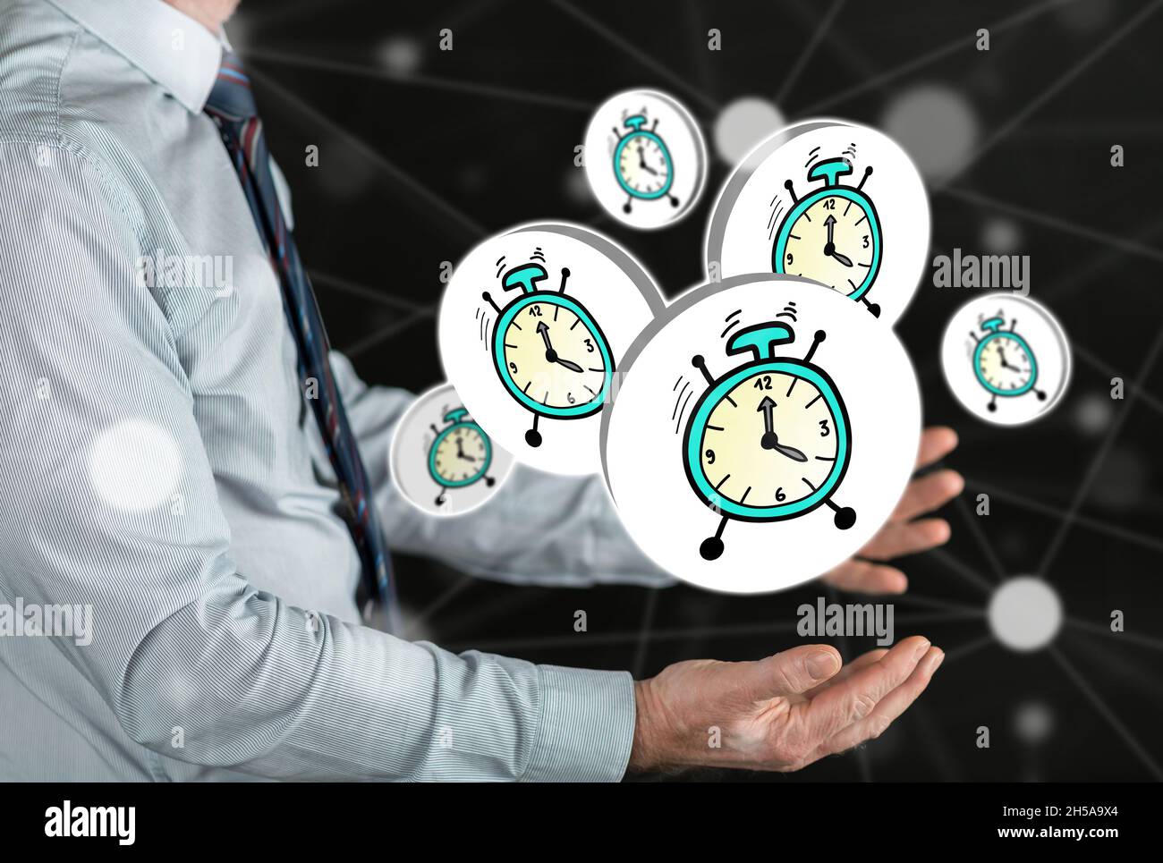 Time concept above the hands of a man Stock Photo - Alamy