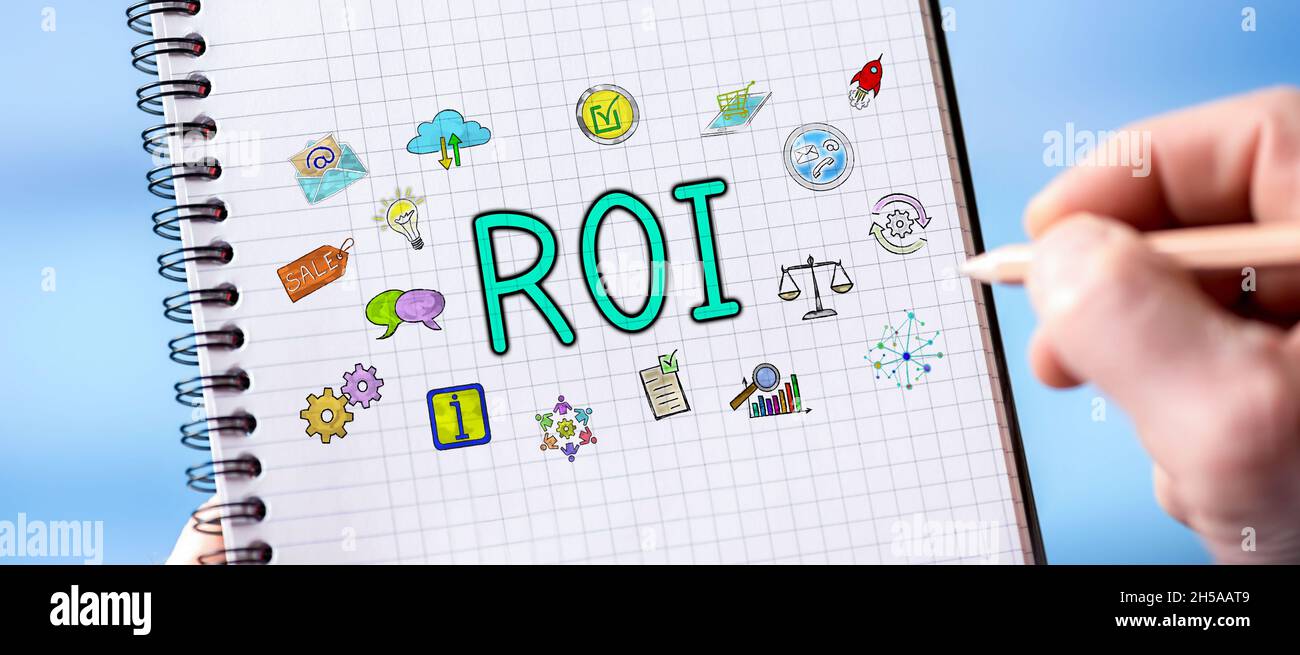 Hand drawing roi concept on a notepad Stock Photo - Alamy