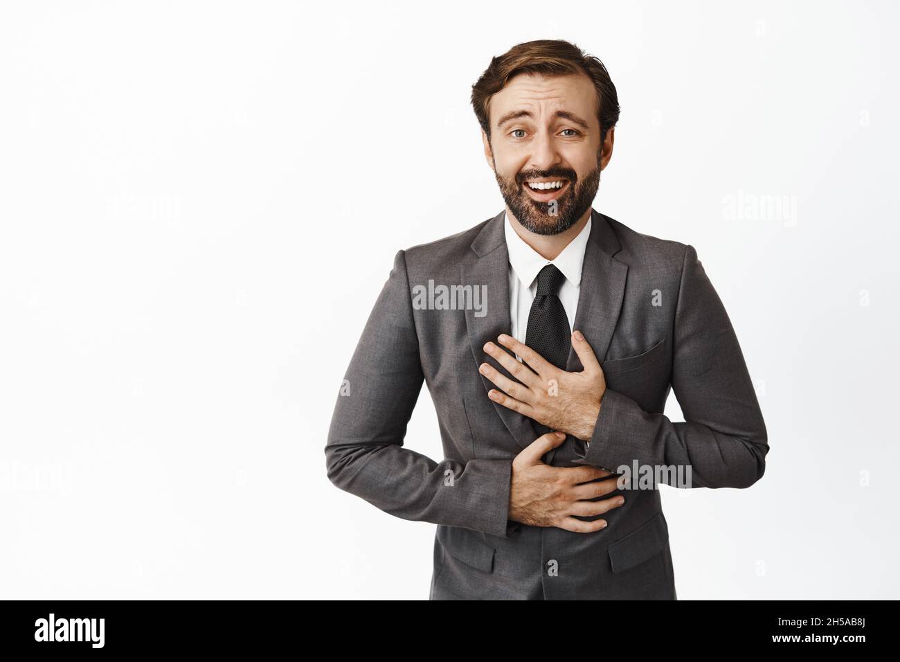 Happy businessman laughing. Corporate man chuckle and holding hands on ...