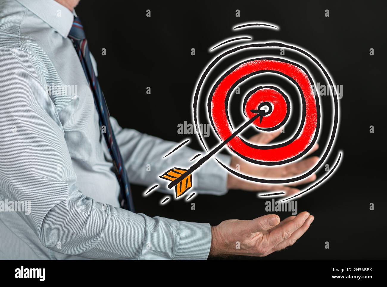 Business target concept above the hands of a man Stock Photo - Alamy