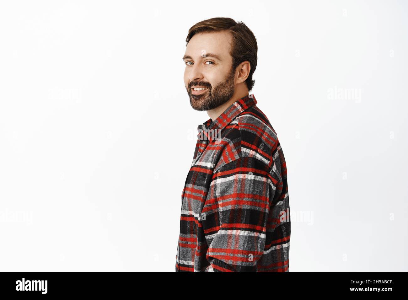 Image of handsome caucasian man 30 years old, turn at camera with happy ...