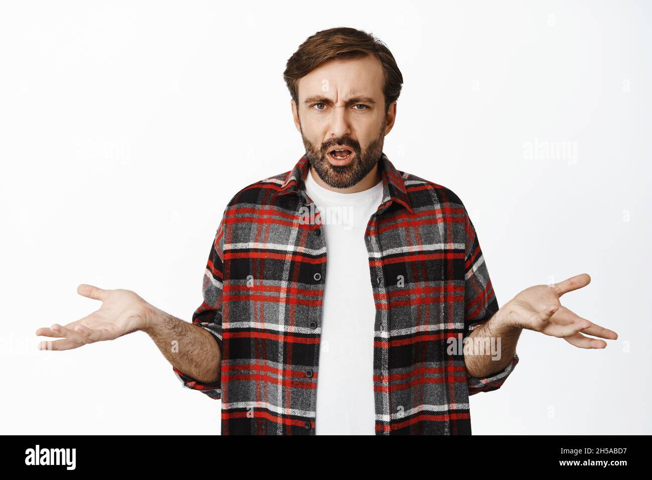 Confused bearded man shrugging, looking frustrated and questioned, dont ...
