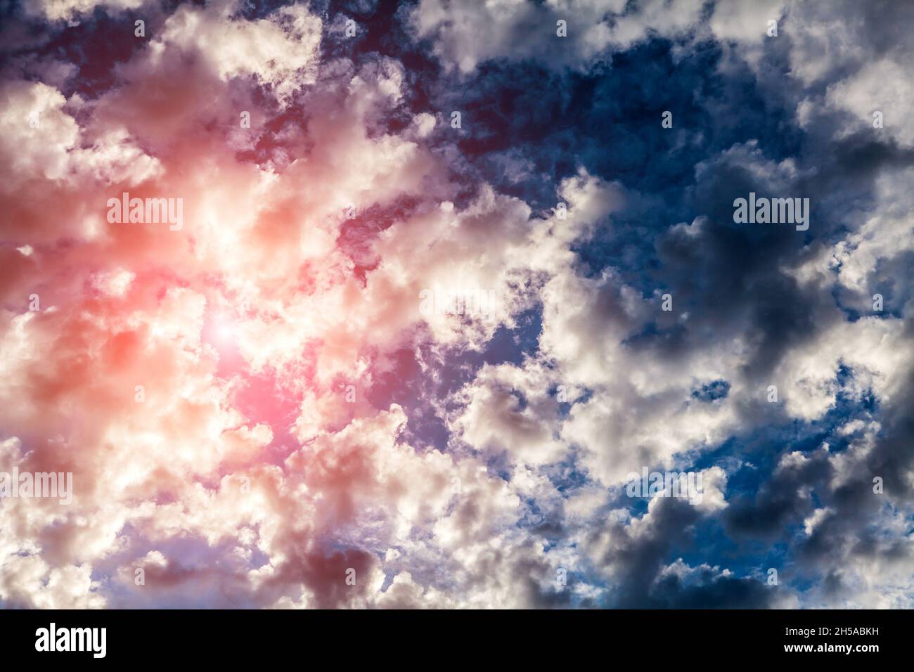 Red Sunlight in the Dark and Dramatic Storm Clouds Stock Photo - Alamy