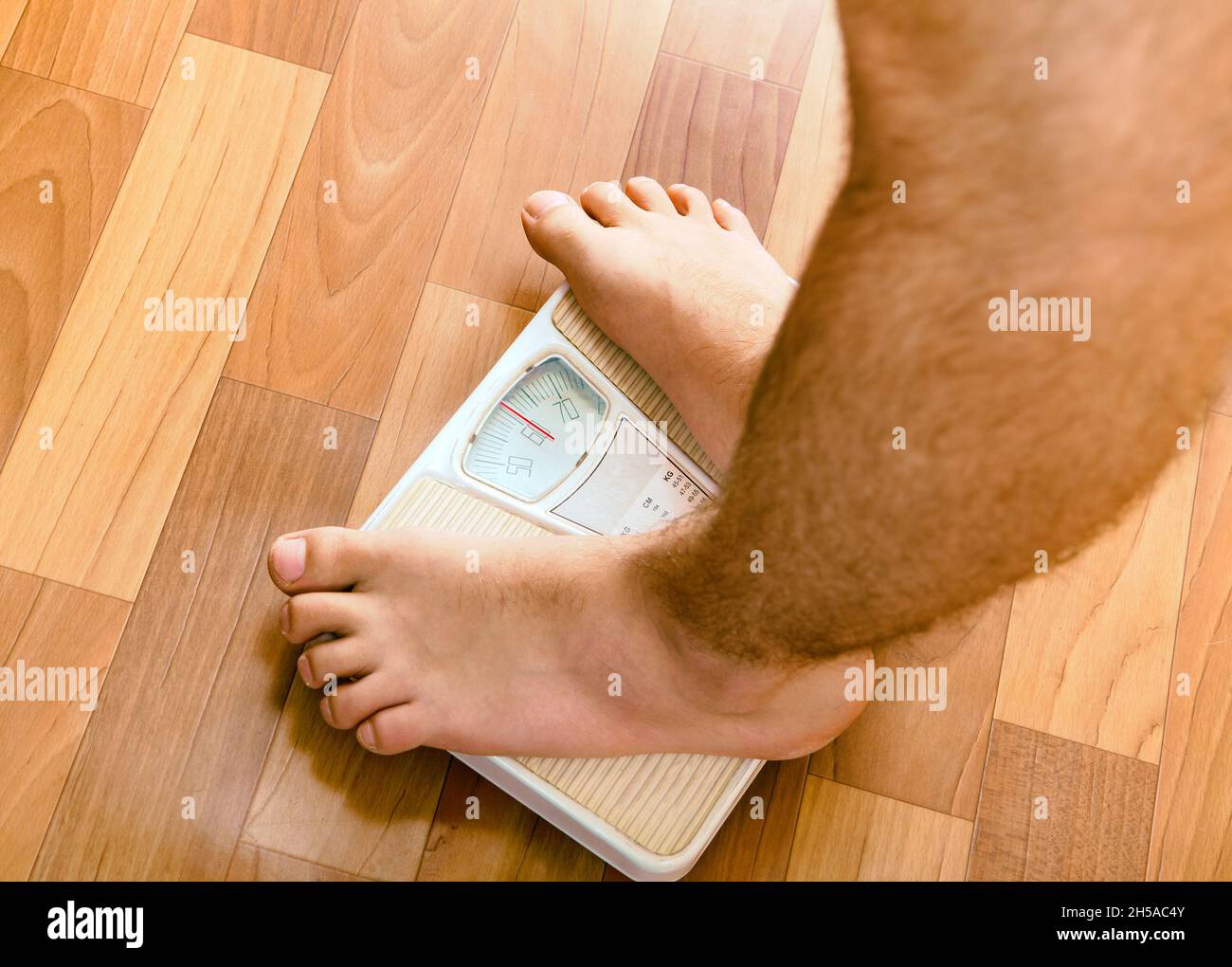 Skinny person scales hi-res stock photography and images - Alamy