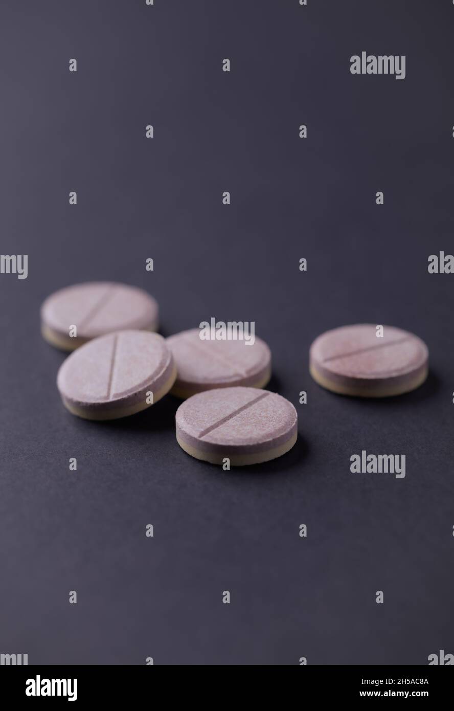 Vitamin effervescent Tablets on paper background. Close up. Copy space ...