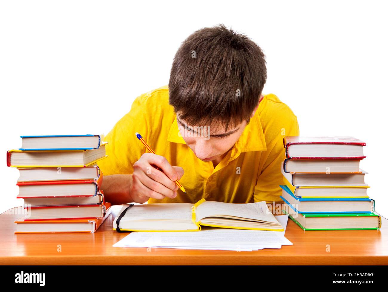 Student with the Books on the Desk Isolated on the White Background ...