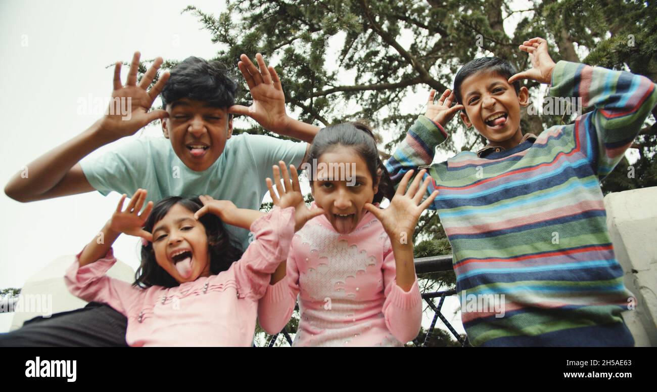 Cheerful kids from Ina fooling around, having fun Stock Photo - Alamy