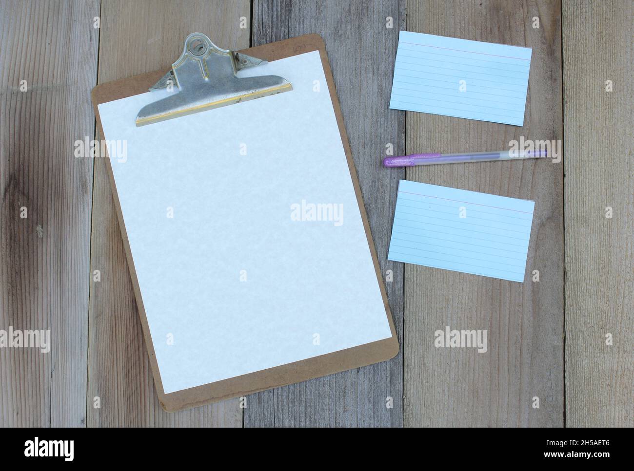 Clipboard With Blank Sheet of Paper on Wooden Table Flat Background ...