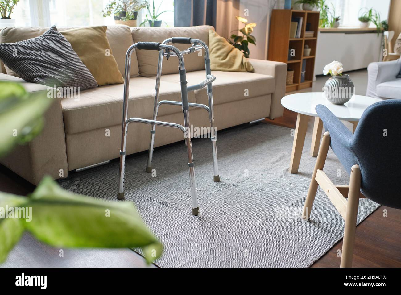 Image of walkers for senior person in empty living room Stock Photo - Alamy