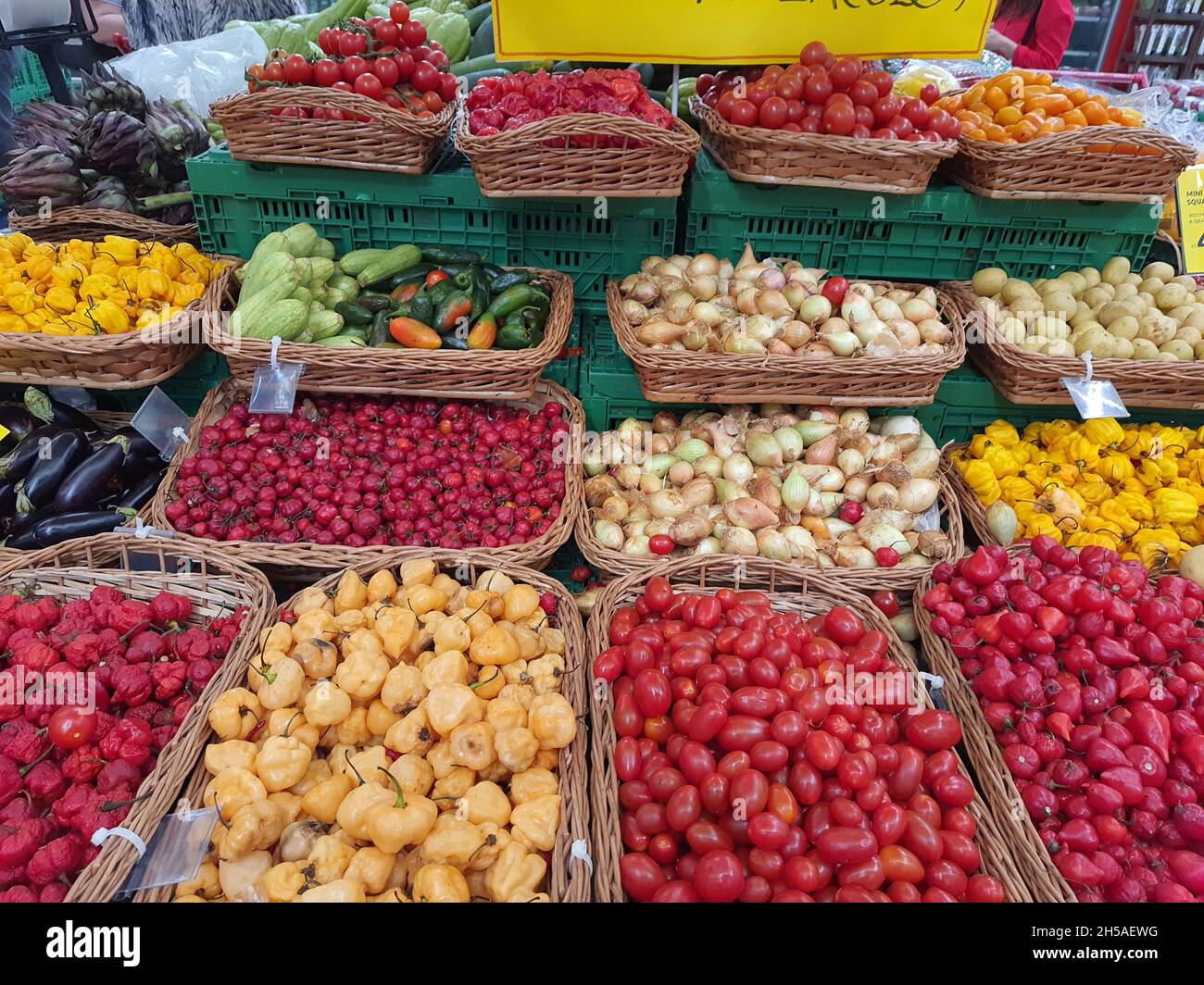 Miniature vegetable and fruit section; cherry tomatoes, red and yellow ...