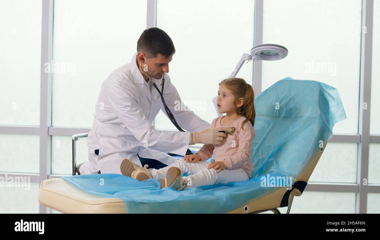 Child Patient Visits the Doctor'S Office. The Doctor Listens to the ...