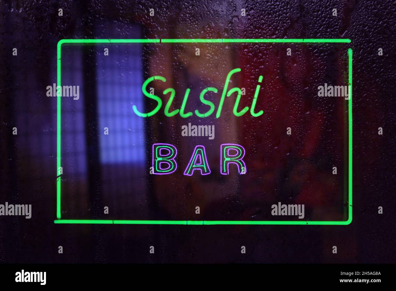 Vintage Neon Sushi Bar Sign in Wet Window Stock Photo - Alamy