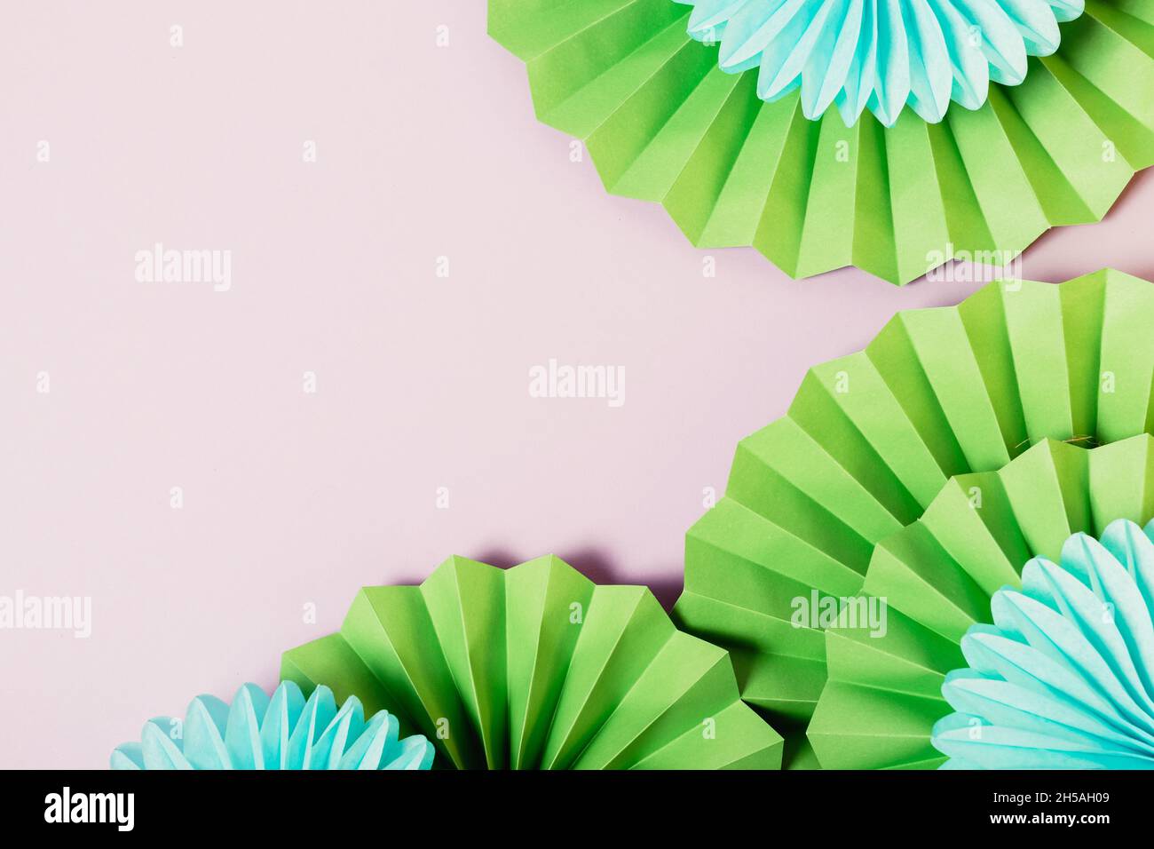Festive background with green and blue paper fans, copy space Stock ...