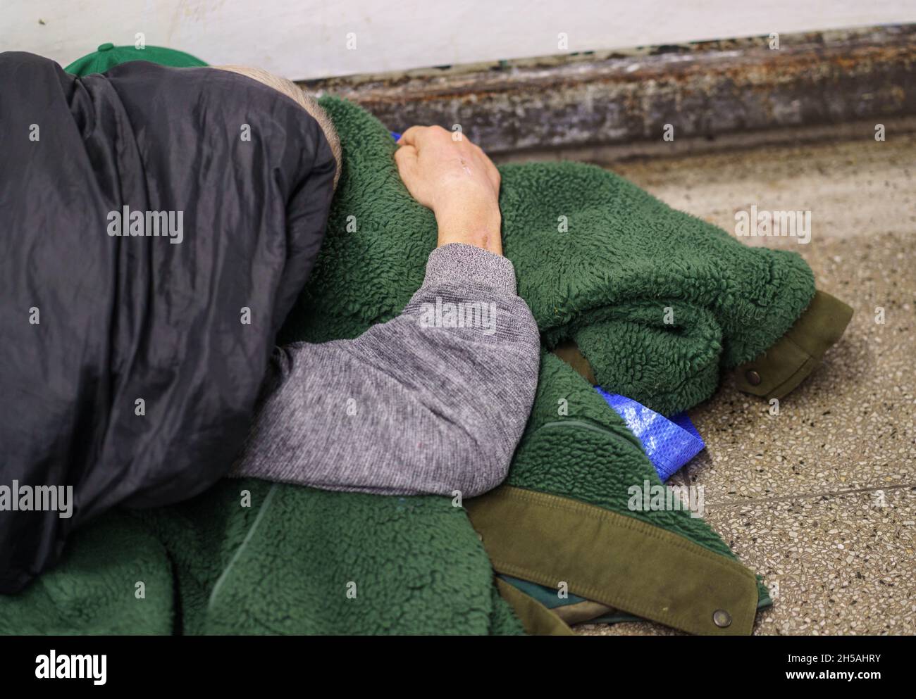 Homeless people sleeping on floor hi-res stock photography and images ...