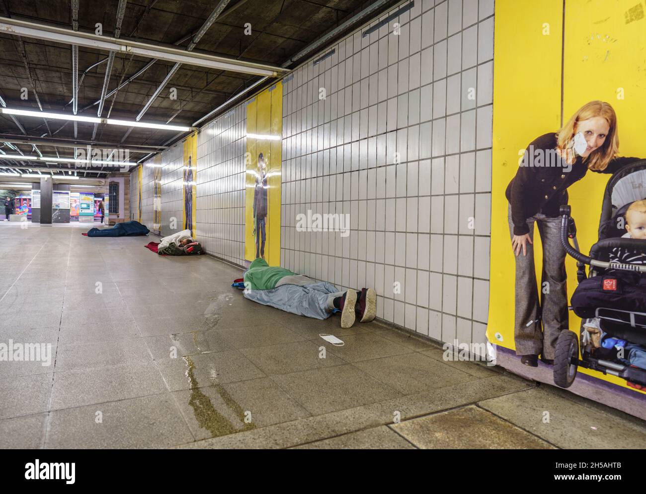 Homeless people sleeping on floor hi-res stock photography and images ...