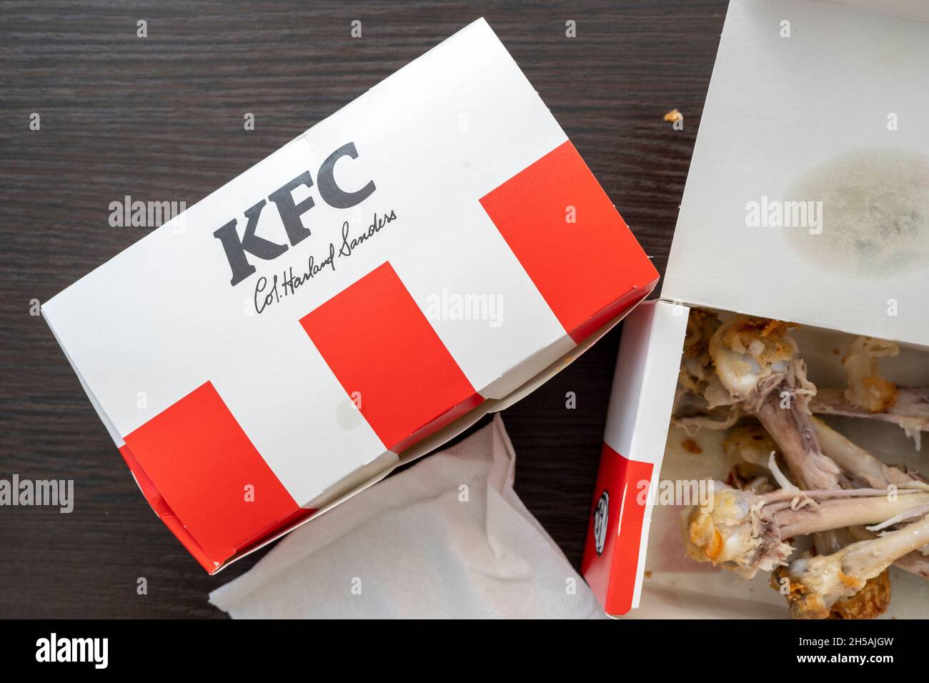 MOSCOW - NOV 07: Leftover food with chicken bones, chicken drumsticks ...