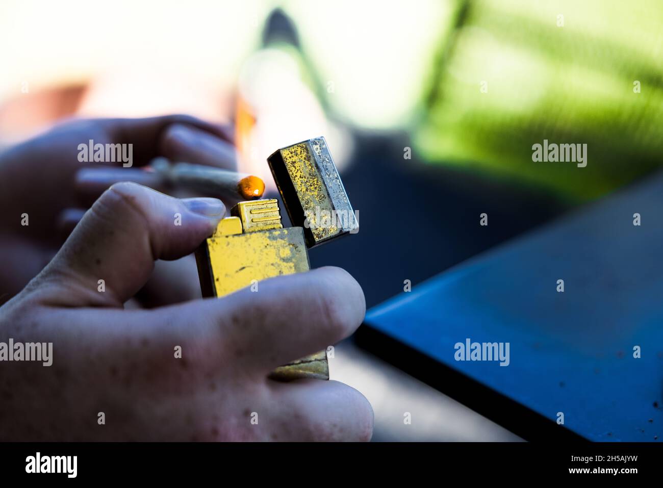 Mans hand lighting joint hi-res stock photography and images - Alamy